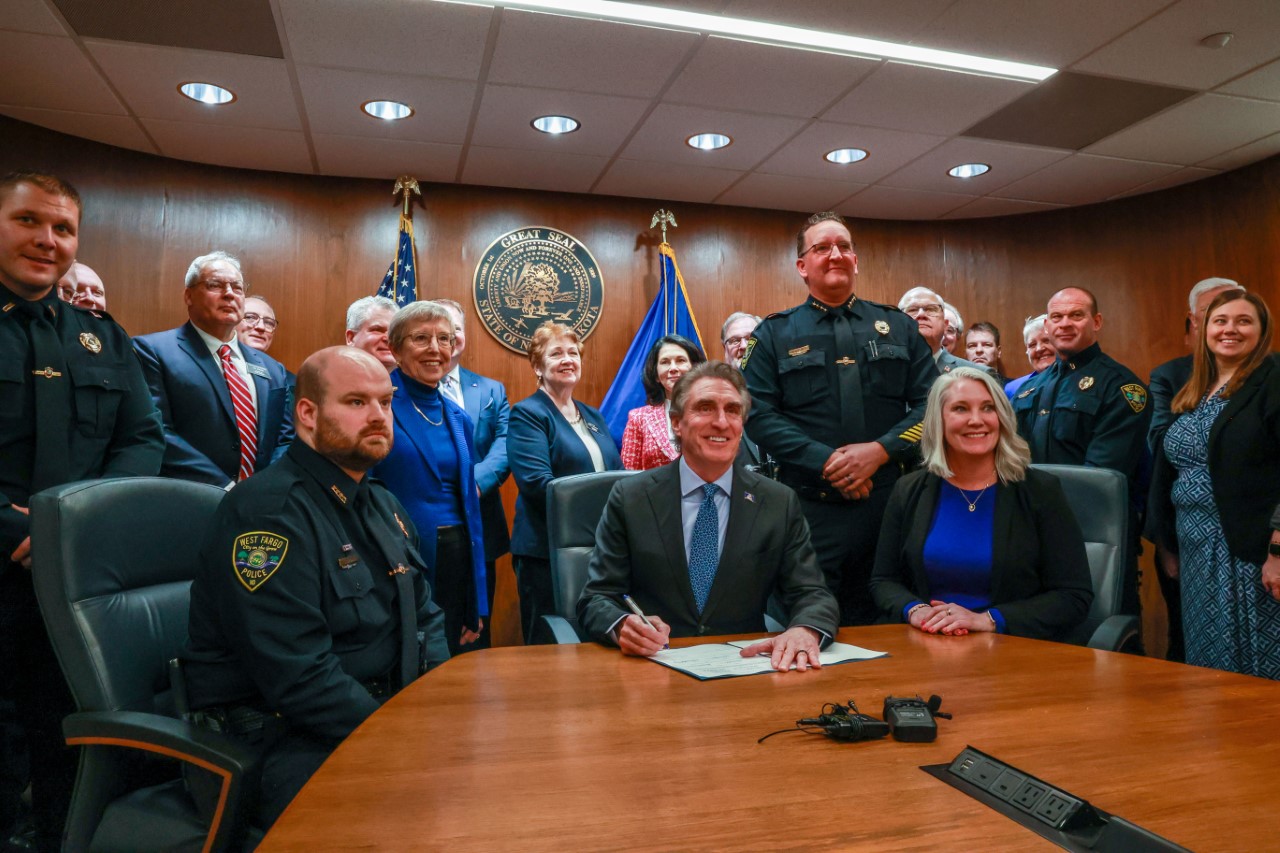 Burgum signs bill expanding workers’ comp for police, firefighters | KNOX News Radio, Local News ...